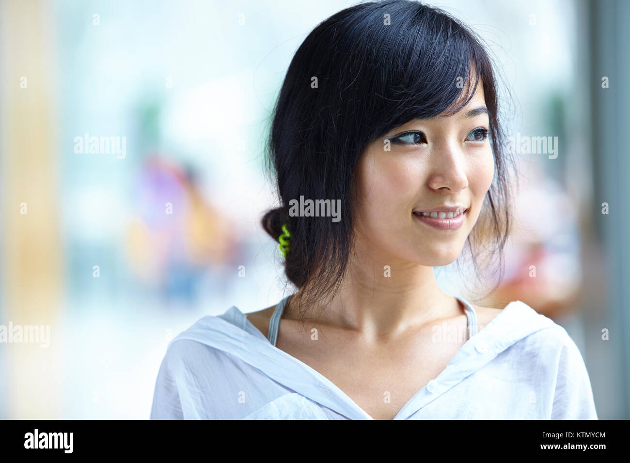 one pretty young Chinese college student portrait Stock Photo - Alamy