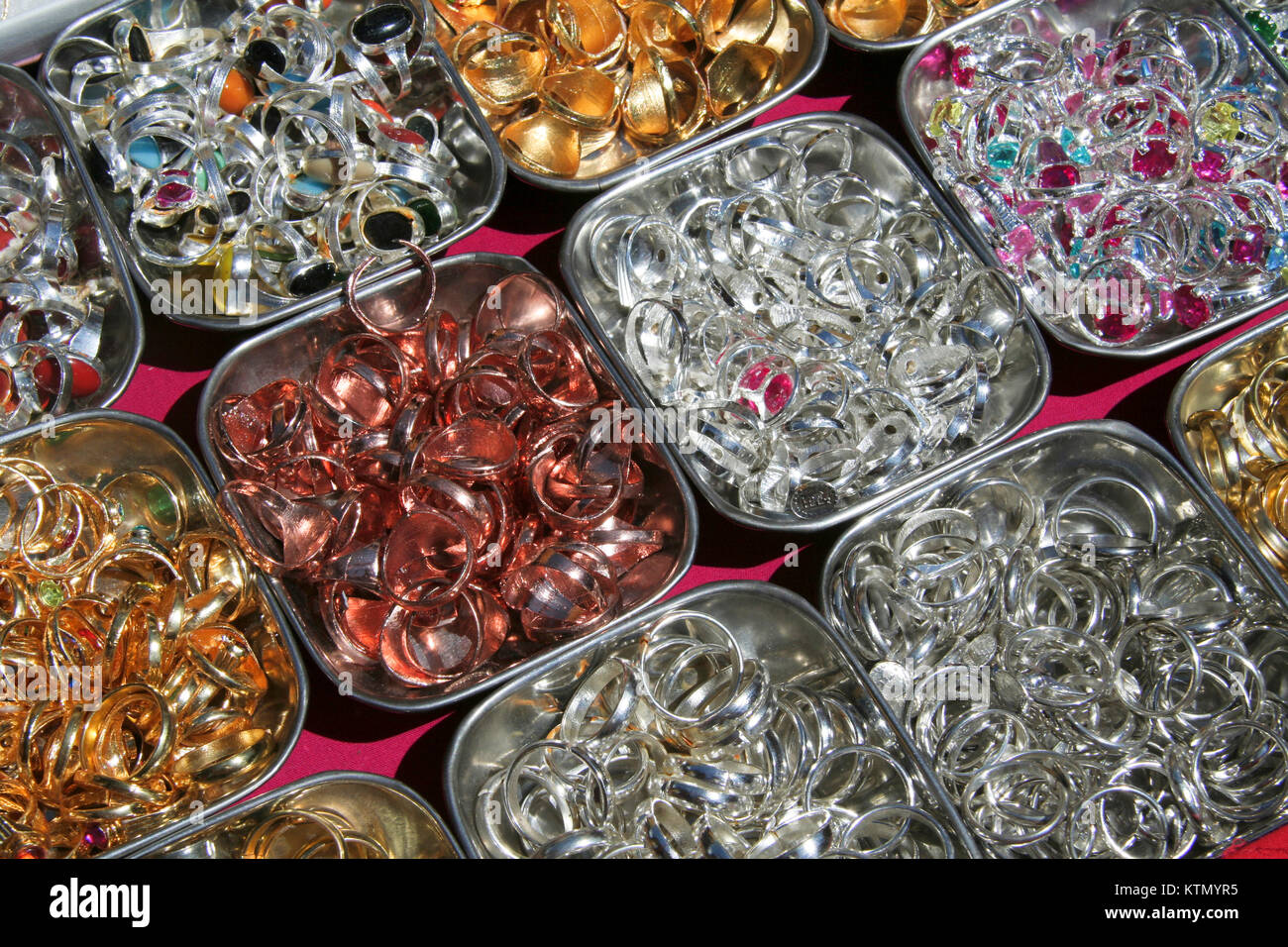 Display of ornamental metal rings in a stall Stock Photo - Alamy