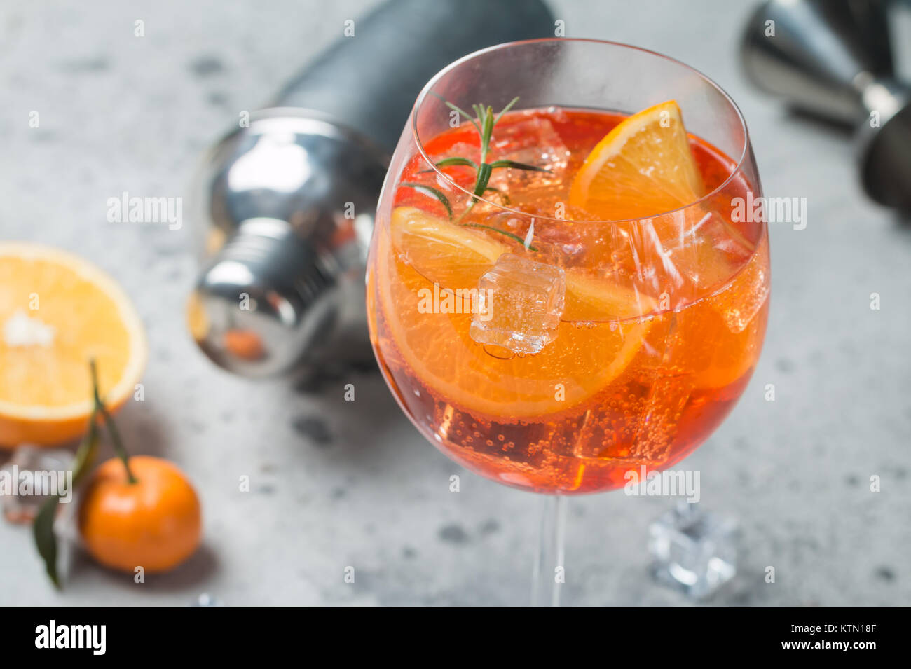 Classic Italian Aperol spritz cocktail in glass on gray background ...