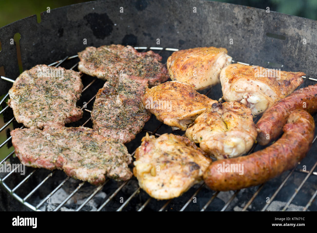 barbecue with delicious grilled meat on grill Stock Photo - Alamy