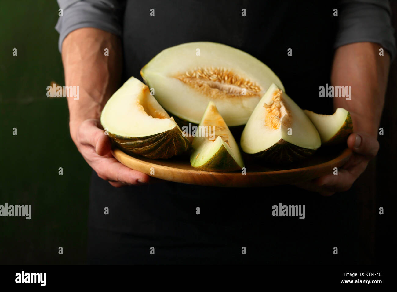 Fresh melon slices on platter, food closeup Stock Photo - Alamy