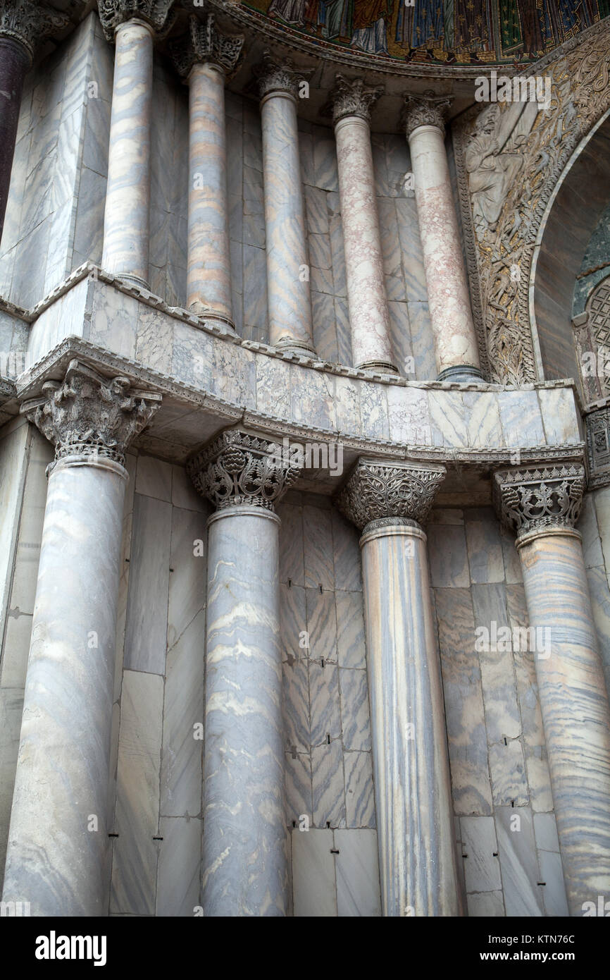 Venice - marble columns in the portal of the cathedral of St. Mark ...