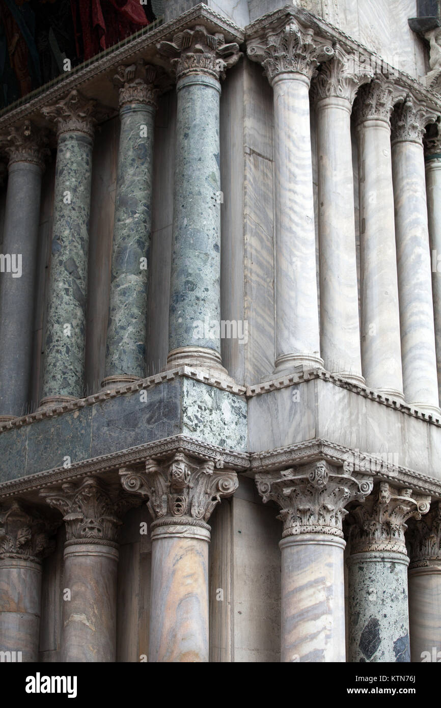 Venice - marble columns in the portal of the cathedral of St. Mark ...
