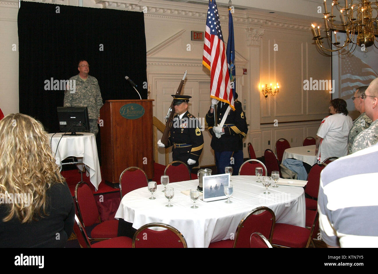 LATHAM-- Chaplain (Col) Eric Olsen stands to attention along with ...