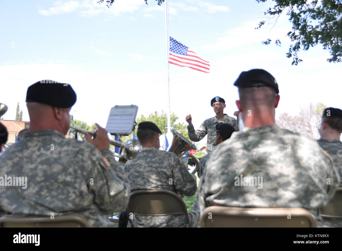 First Sergeant Justin Ahrens, 1st Armored Division Band leads the 1AD ...