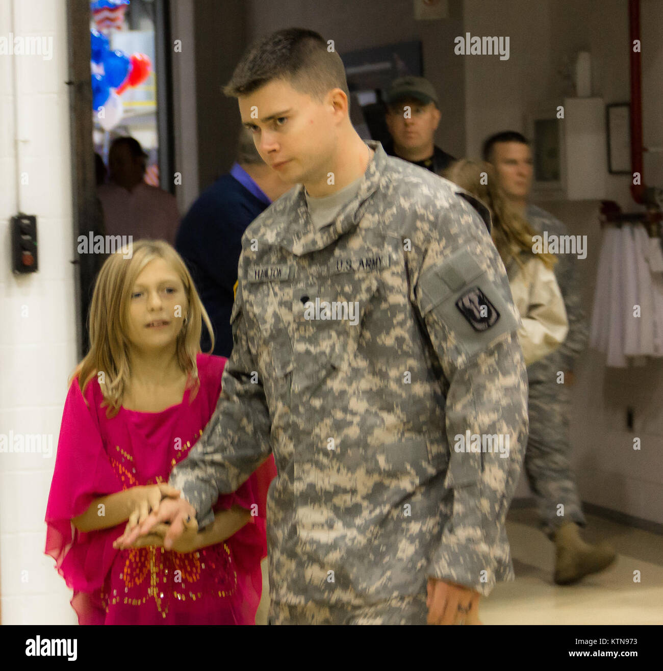 ROCHESTER, NY -- SPC Marton and a family member after the Yellow Ribbon ...