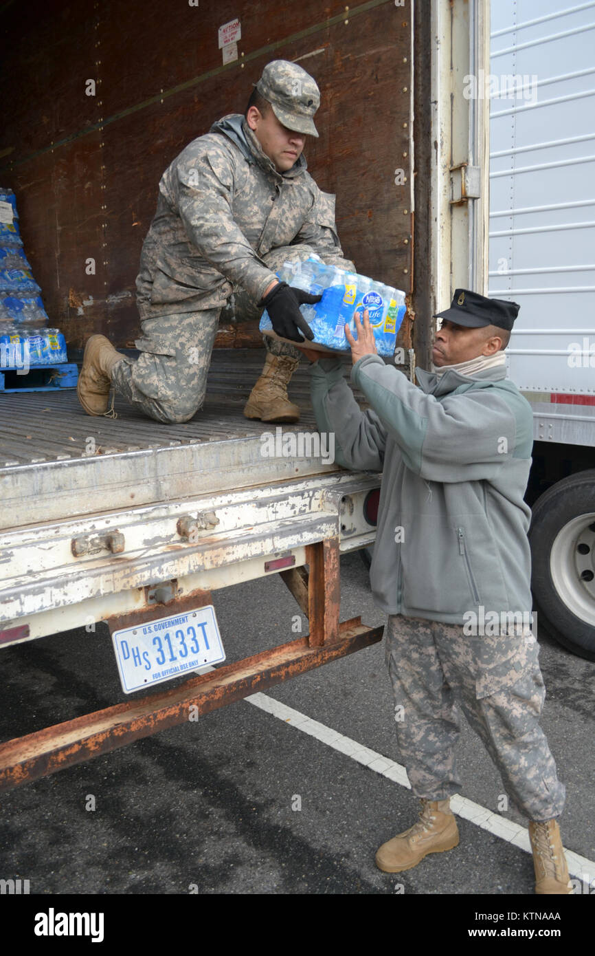 CITI FIELD, QUEENS, NEW YORK -- NYARNG Specialist Joely Rosario hands ...
