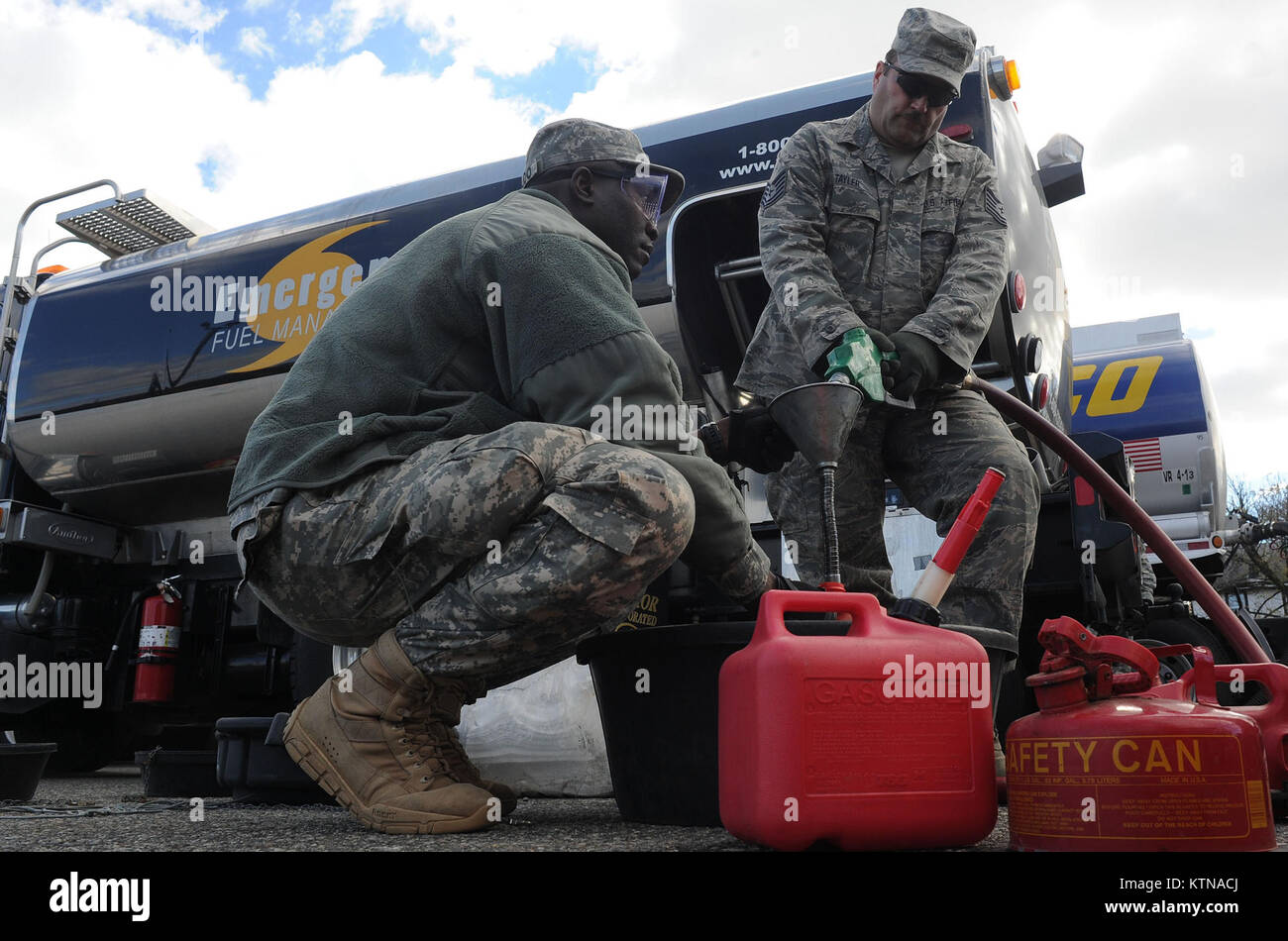 Army Sgt. Adama Ilbouda, left, with the New York Army National Guard ...
