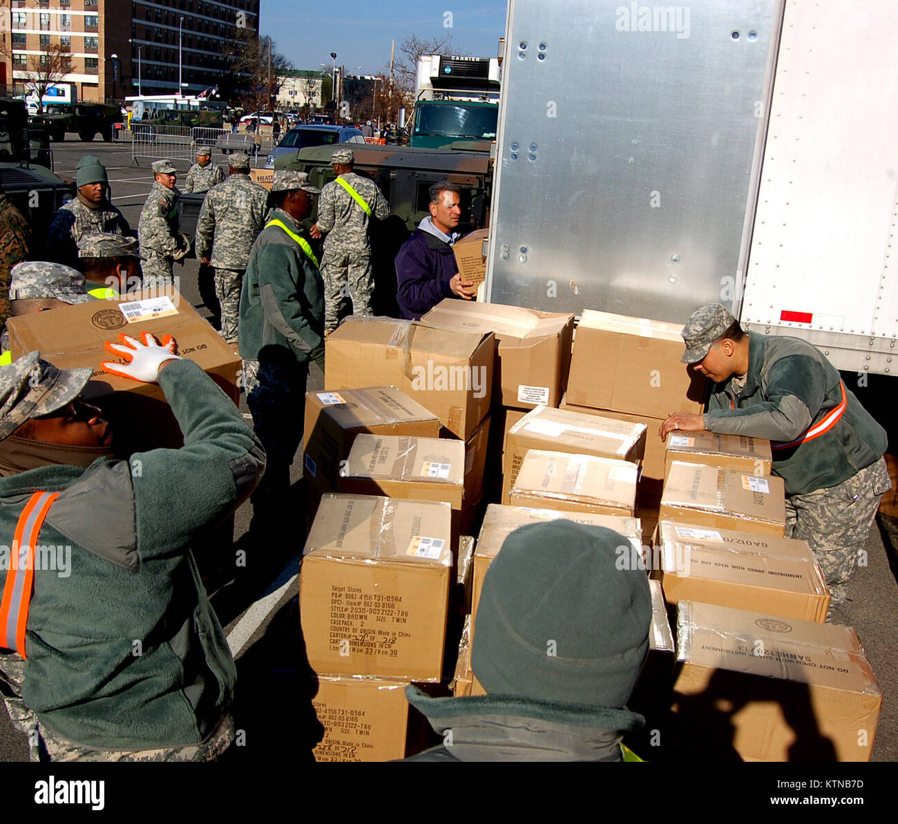 BROOKLYN, NY -- Soldiers of the 642nd Aviation Support Battalion load ...