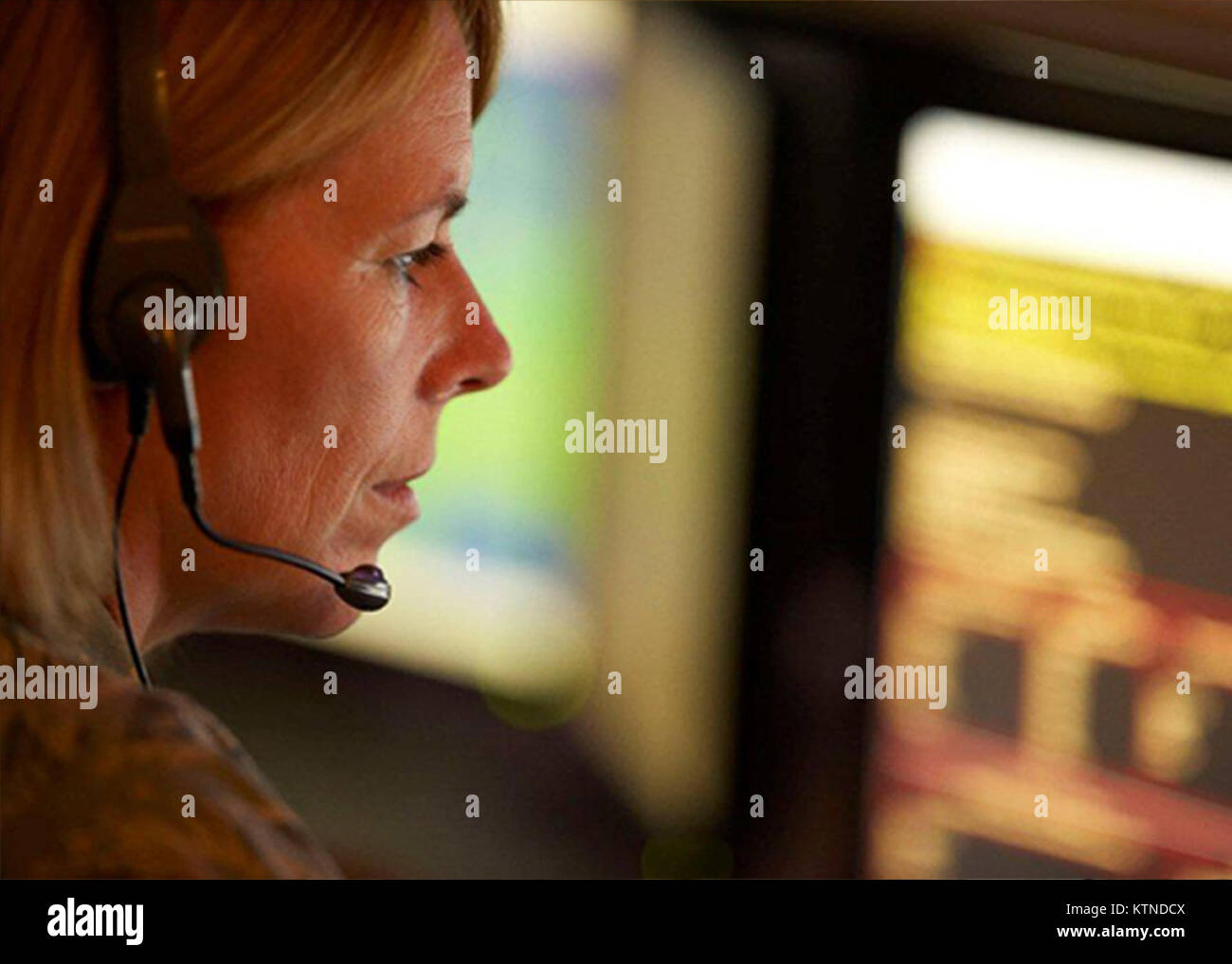 Lady operator wearing headset Stock Photo - Alamy