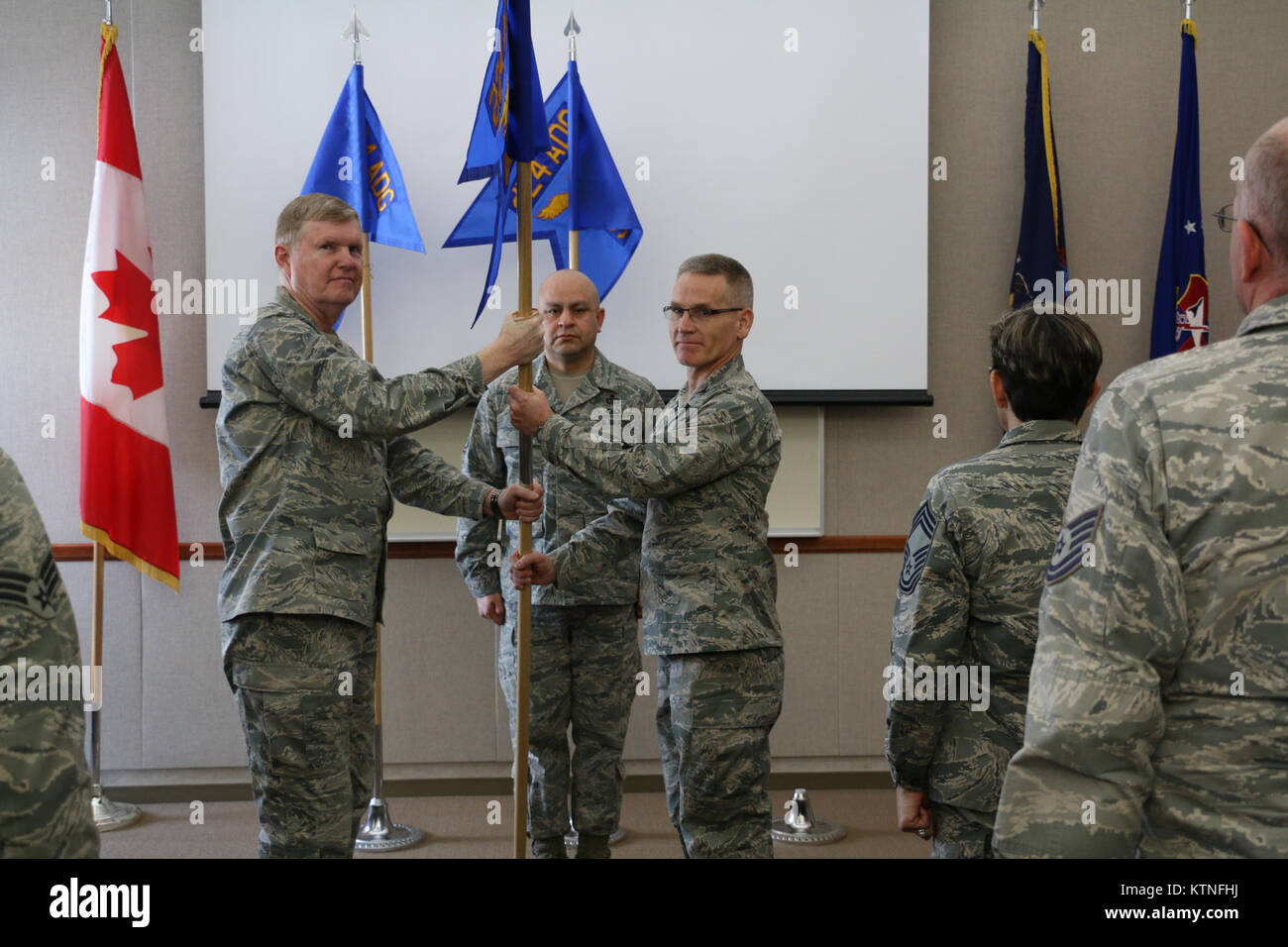 Maj. Gen. Verle Johnston hands the guidon to Col. Wendel Smith on ...