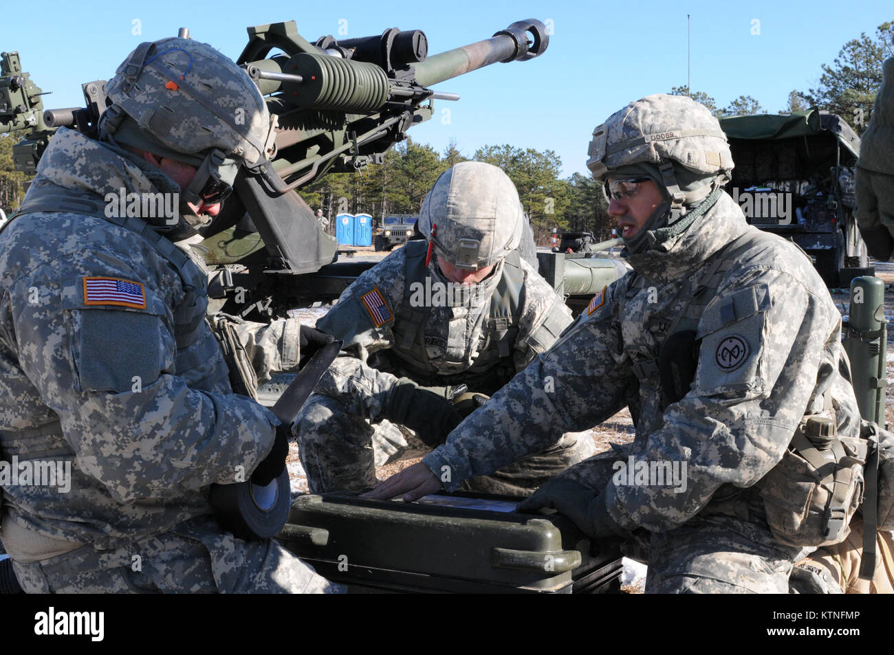 (Left to right) PV2 Robert Dudek, Number 1 Man, Sgt. Christopher ...