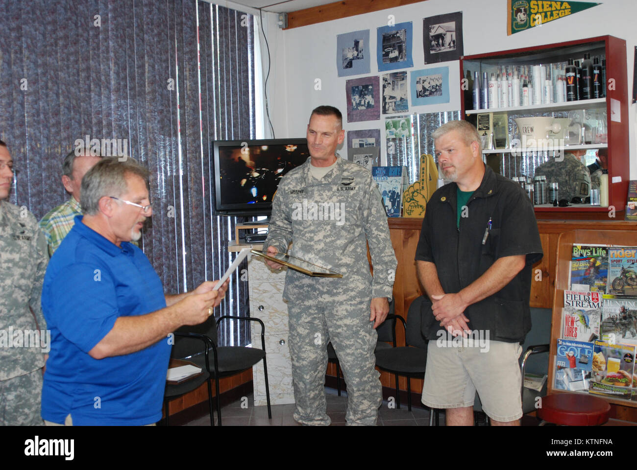 LATHAM- ESGR Employer Support Specialist John Willsey reads a ...