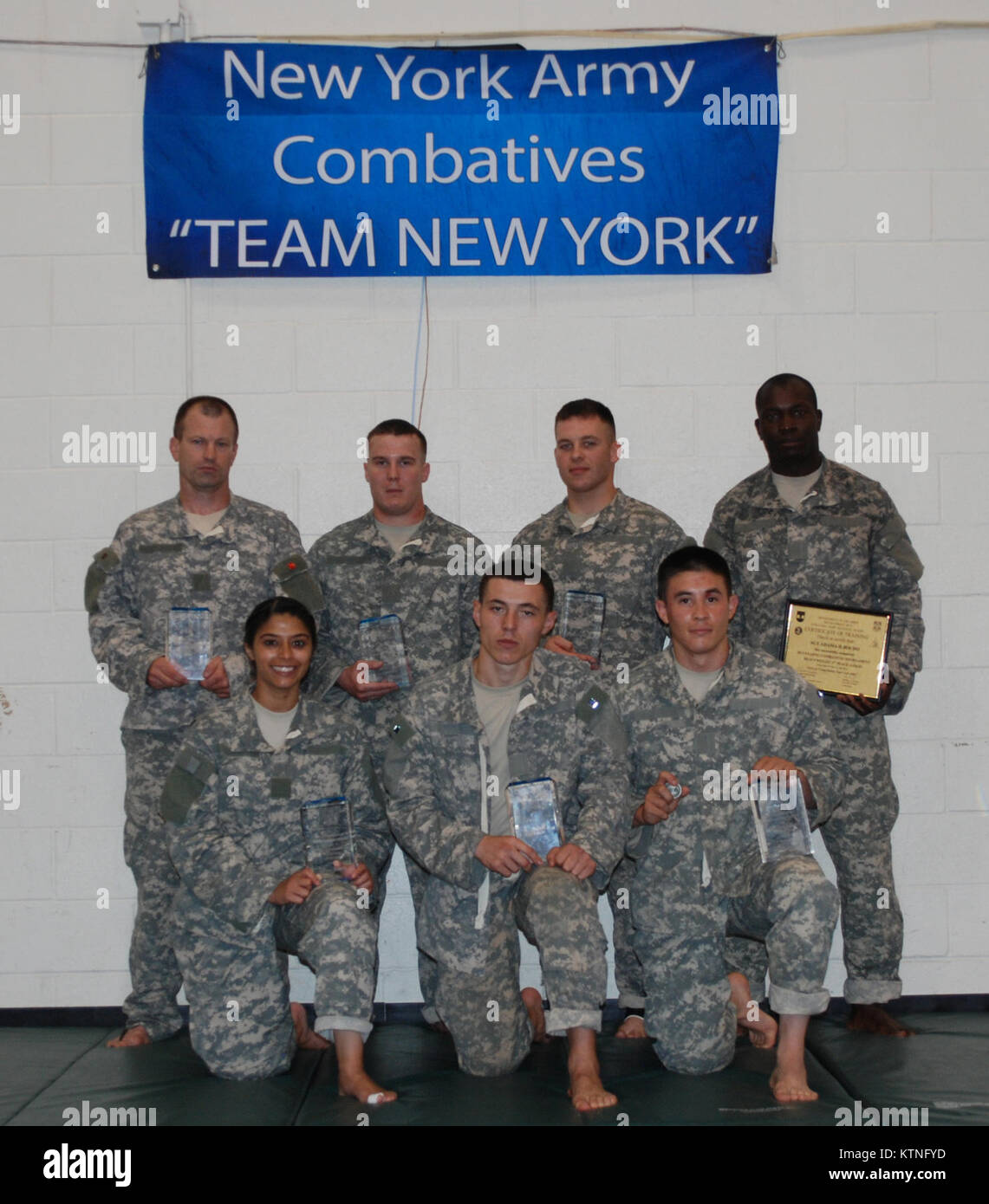 CAMP SMITH, N.Y. -- Soldiers pose after winning first-place trophies in ...