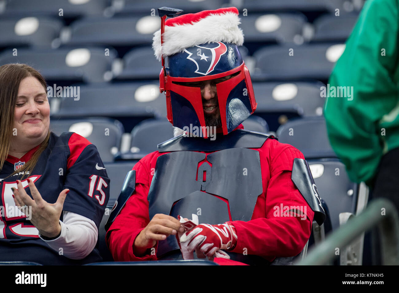 Houston, TX, USA. 25th Dec, 2017. A Houston Texans fan wears a ...