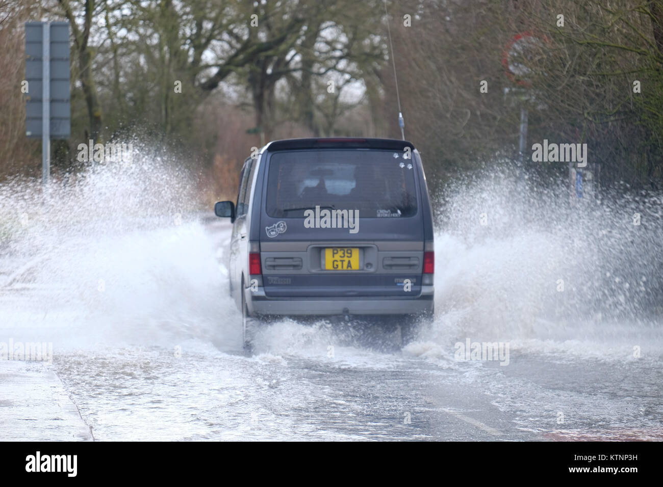 cars drive through flood water on mountsorrel lane Stock Photo - Alamy