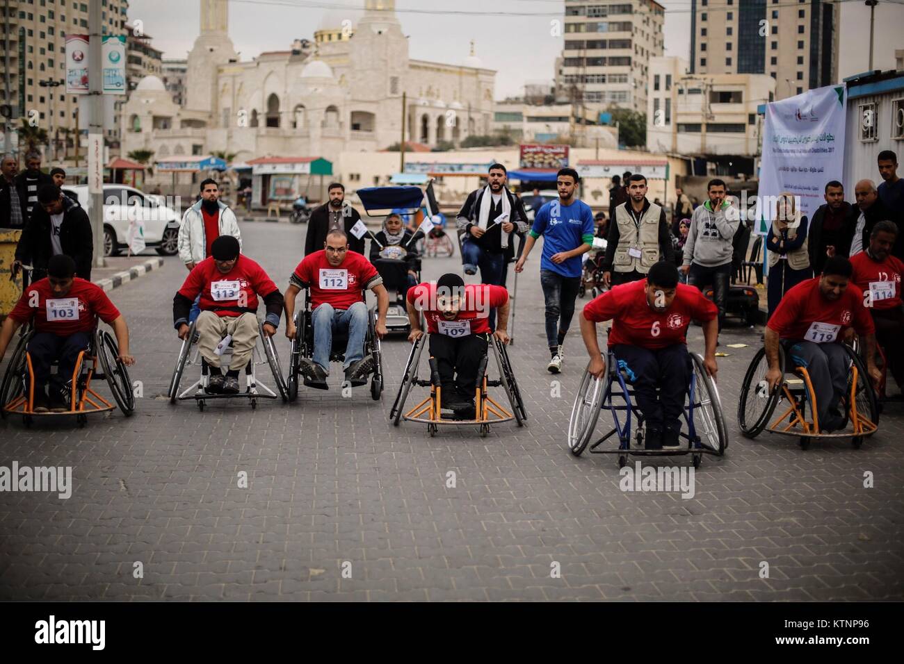 Palestinian disabled men take part in a wheelchair marathon at the Gaza ...