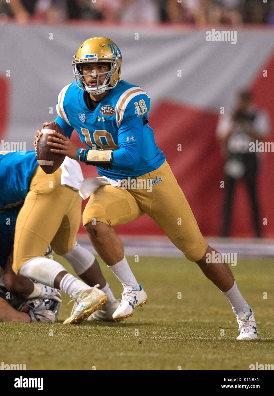 Phoenix, AZ, USA. 26th Dec, 2017. UCLA quarterback (14) Devon Modster ...