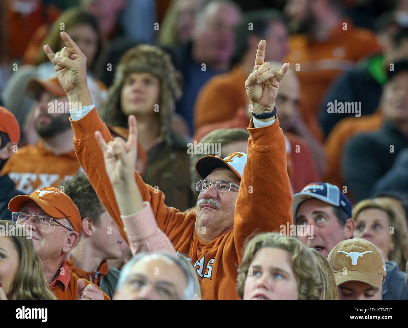 Houston, TX, USA. 27th Dec, 2017. A Texas Longhorns fan celebrates ...