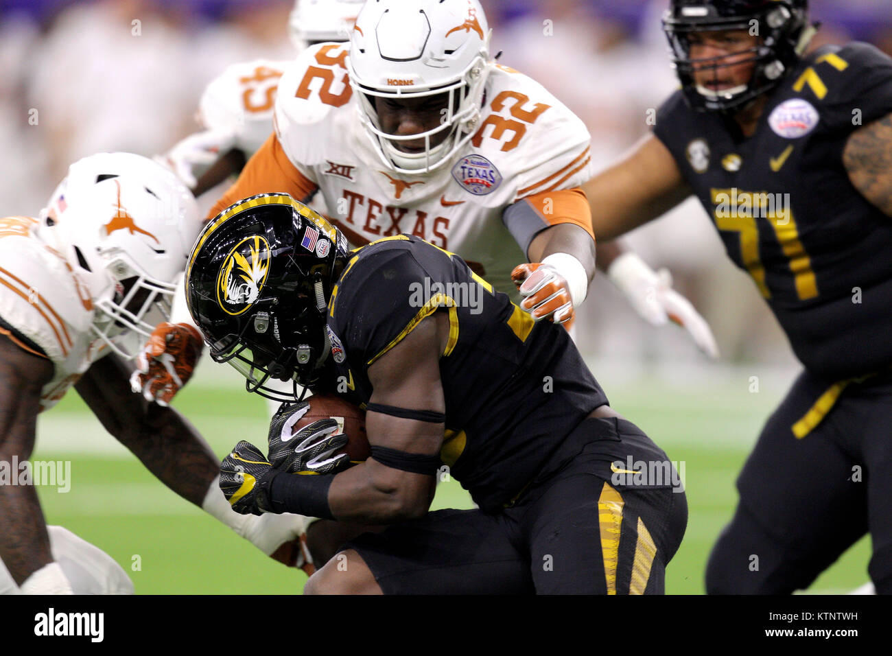 Houston, Texas, USA. 27th Dec, 2017. Missouri Tigers running back Larry ...