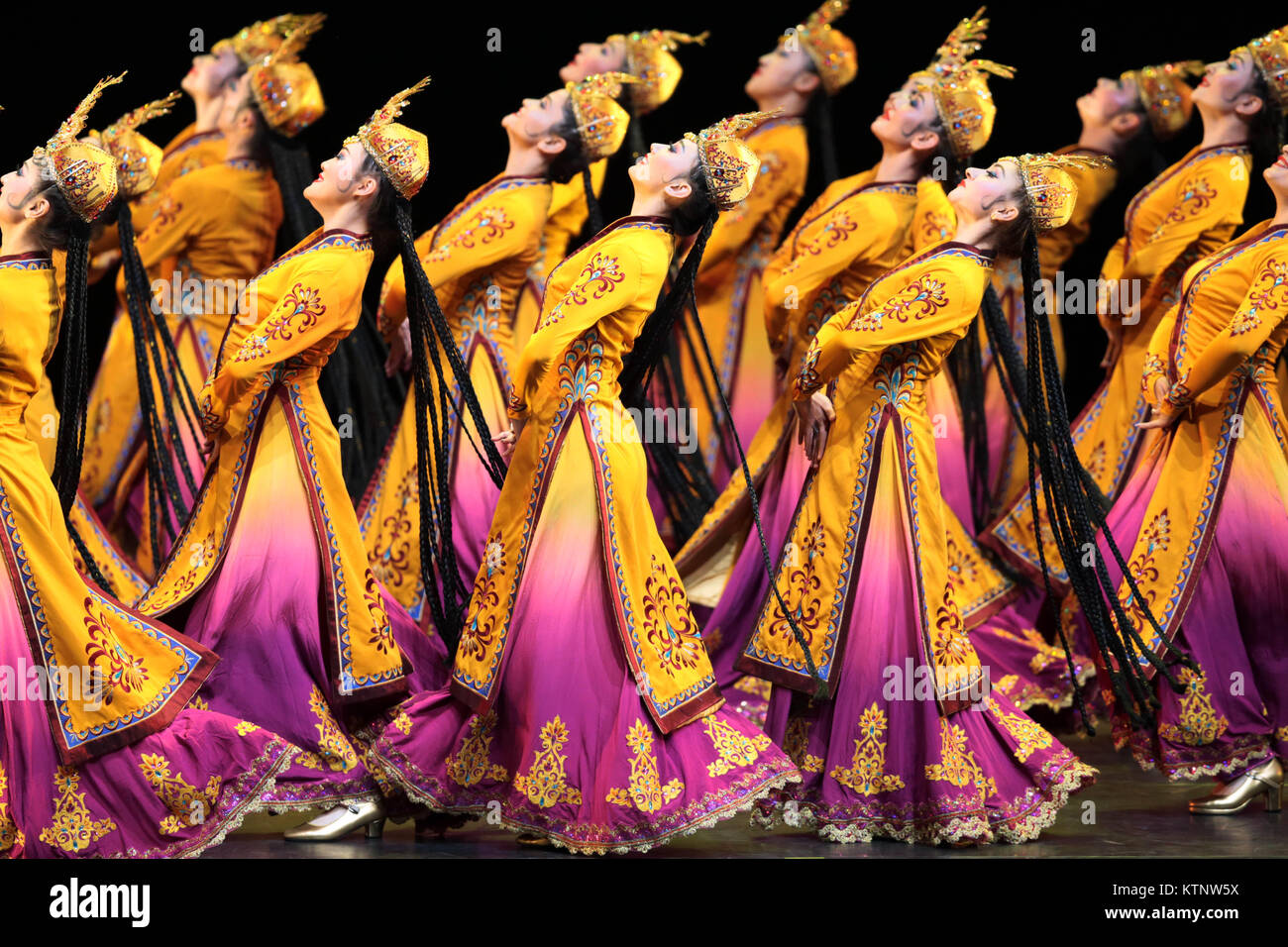 Beijing, China. 27th Dec, 2017. Dancers from the art troupe of Xinjiang ...