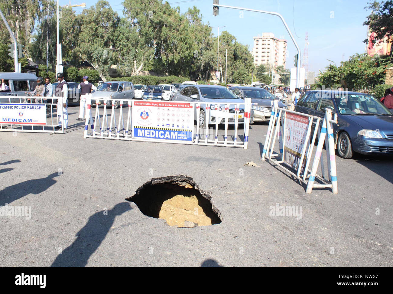 A huge pit occurred on road nearby Hotel Metropol in Karachi on ...