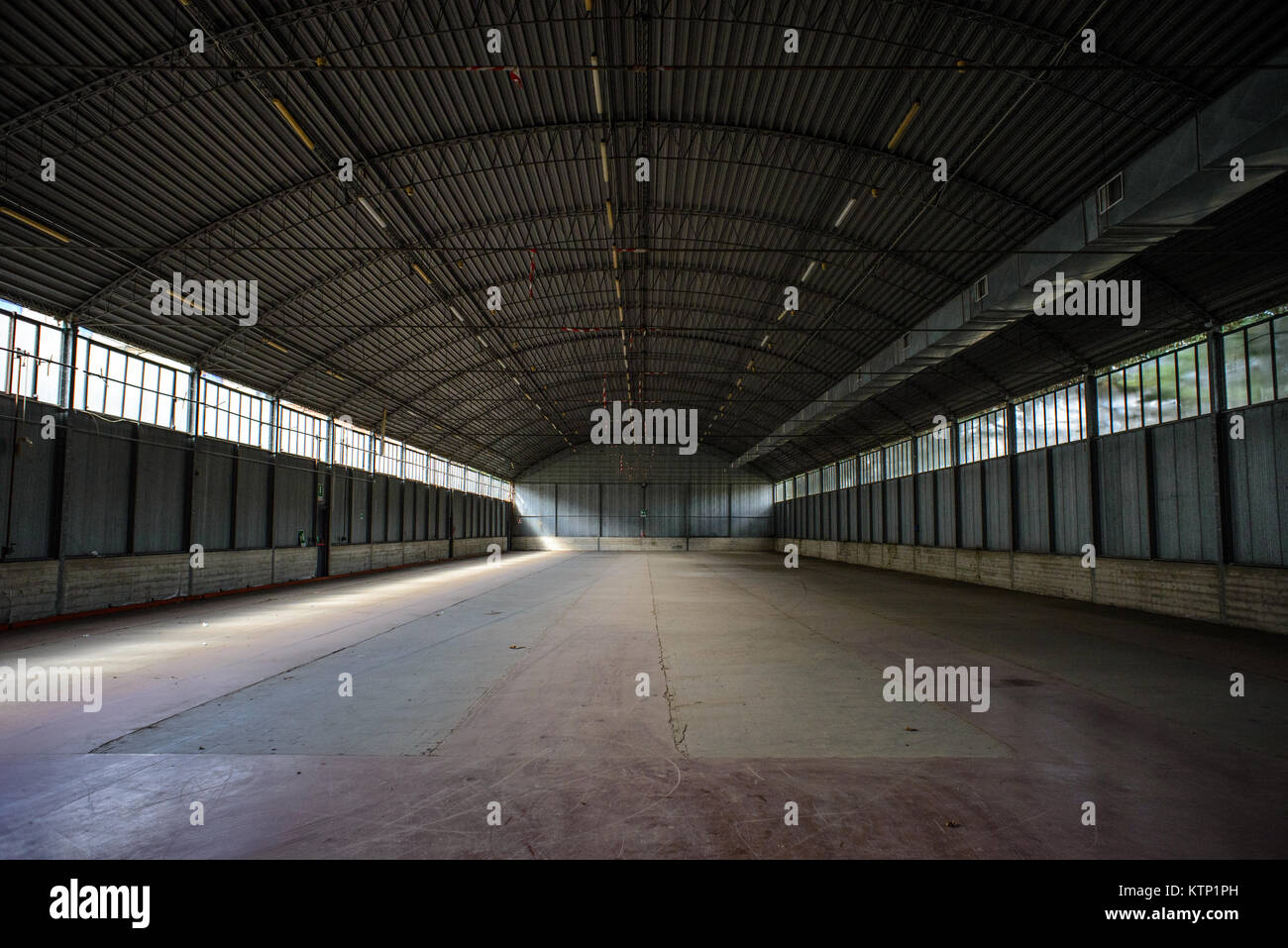 View from inside an old and large disused industrial warehouse Stock ...