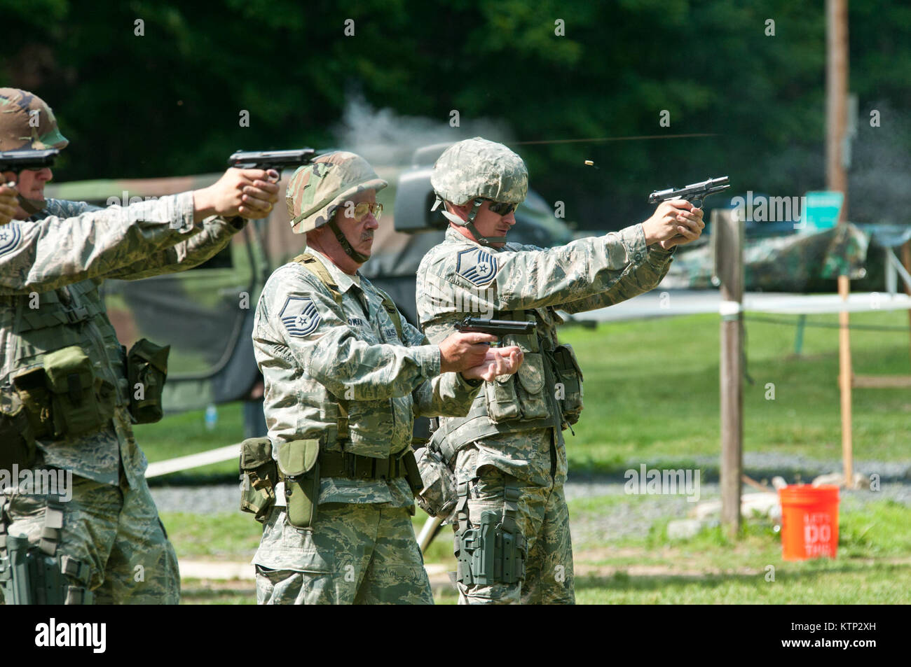 Master Sgt. Paul Cowan and Master Sgt. Nathan McCloud of the 174th ...