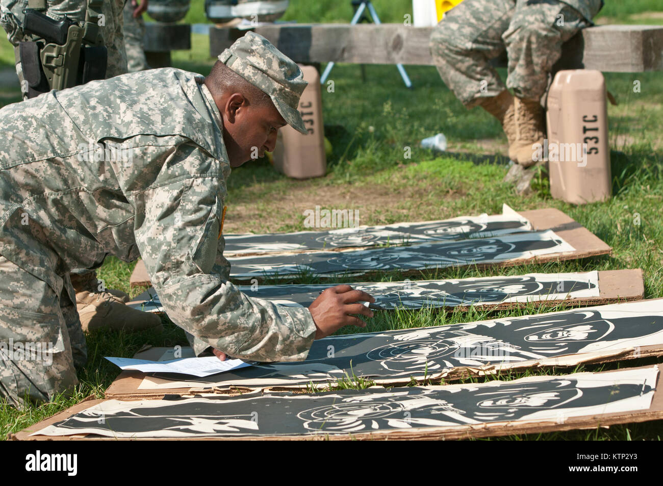 Spc. Isaac scores a target during the General George Patton Pistol ...