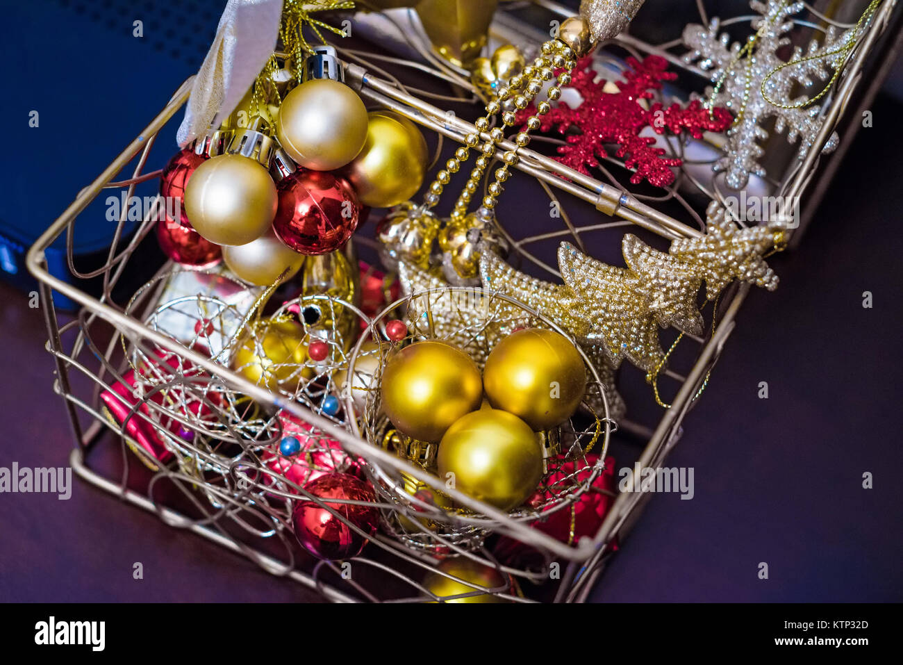 Closeup of golden metal box with colorful Christmas decorations Stock ...