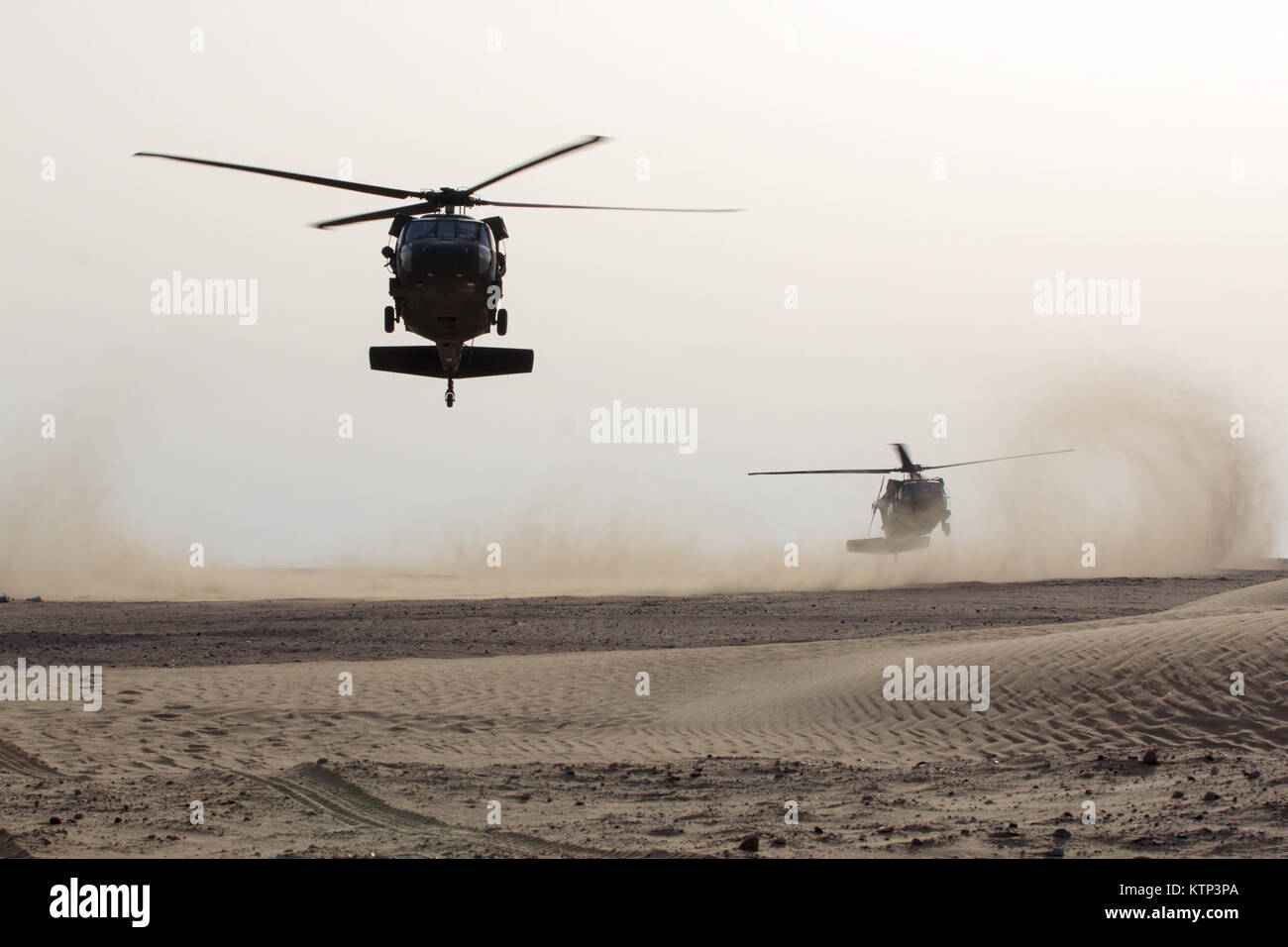 Two UH-60 Blackhawks operated by A Co., 1-189th Attack Reconnaissance ...