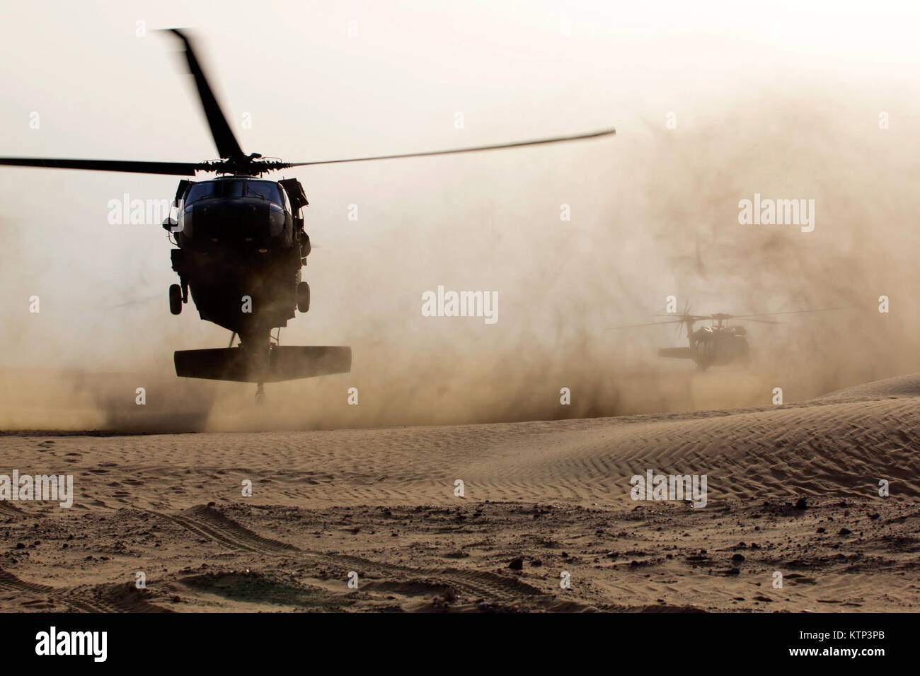 Two UH-60 Blackhawks operated by A Co., 1-189th Attack Reconnaissance ...