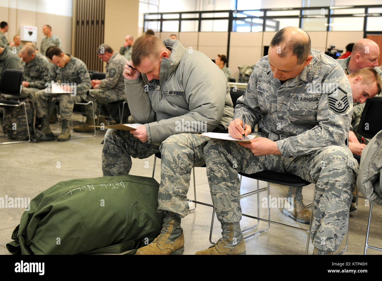 Members of the New York Air National Guard’s 174th Attack Wing fill out ...