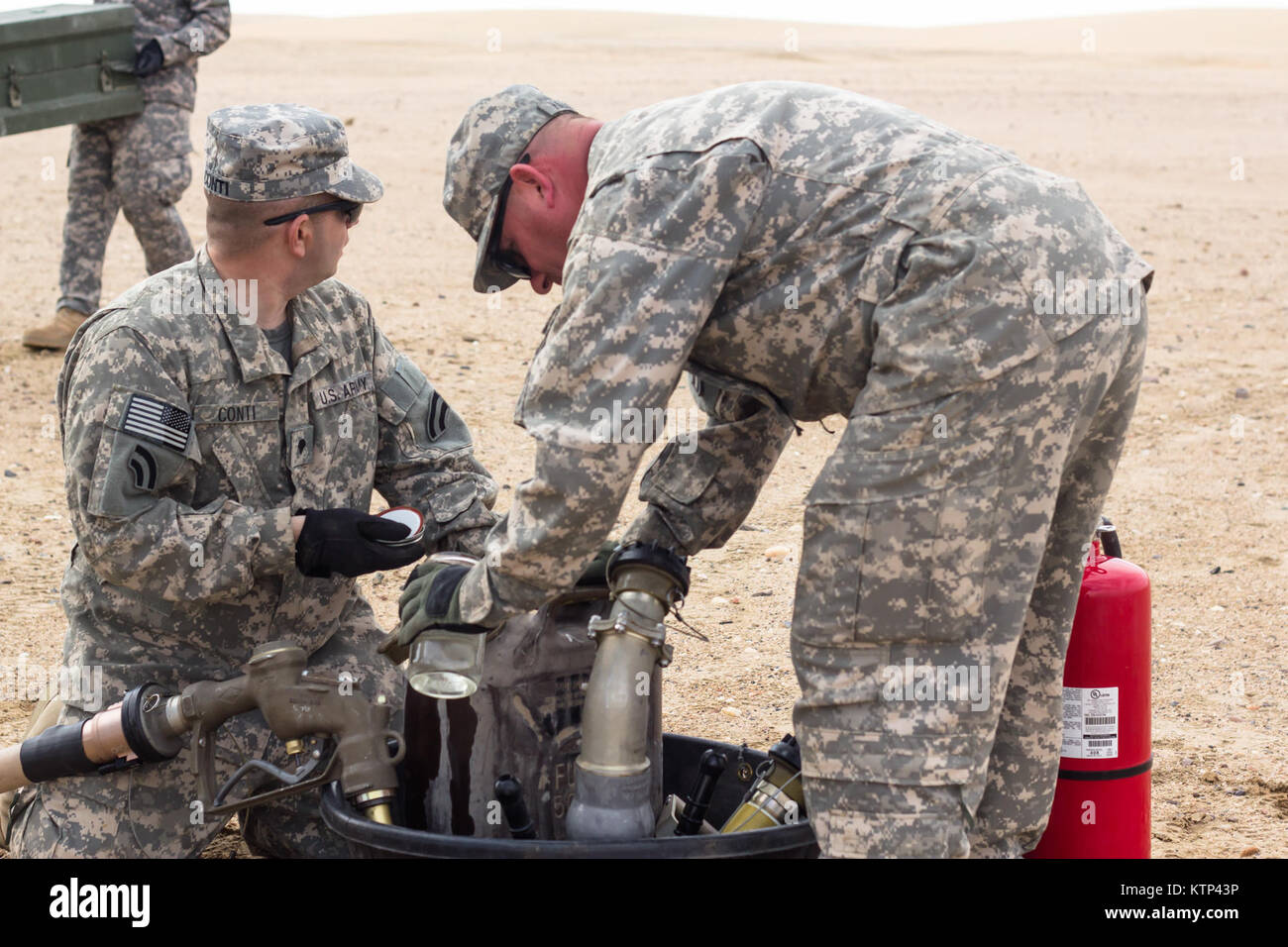 Spc. James Conti and Staff Sgt. Daniel Hallows, soldiers with A Company ...