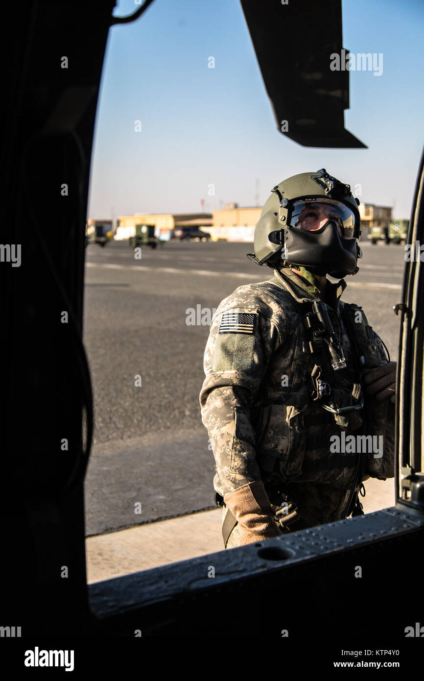 Spc. Nichols, a UH-60 Blackhawk crew chief wtih A Company, 3rd ...