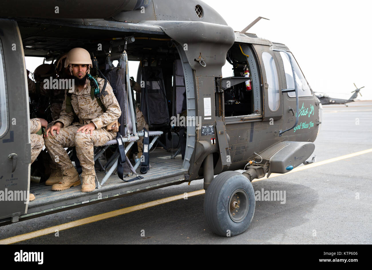 Royal Saudi Land Forces (RSLF) soldiers load onto a UH-60 Black Hawk ...