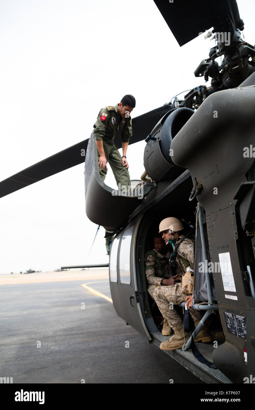 Royal Saudi Land Forces (RSLF) soldiers load onto a UH-60 Black Hawk ...