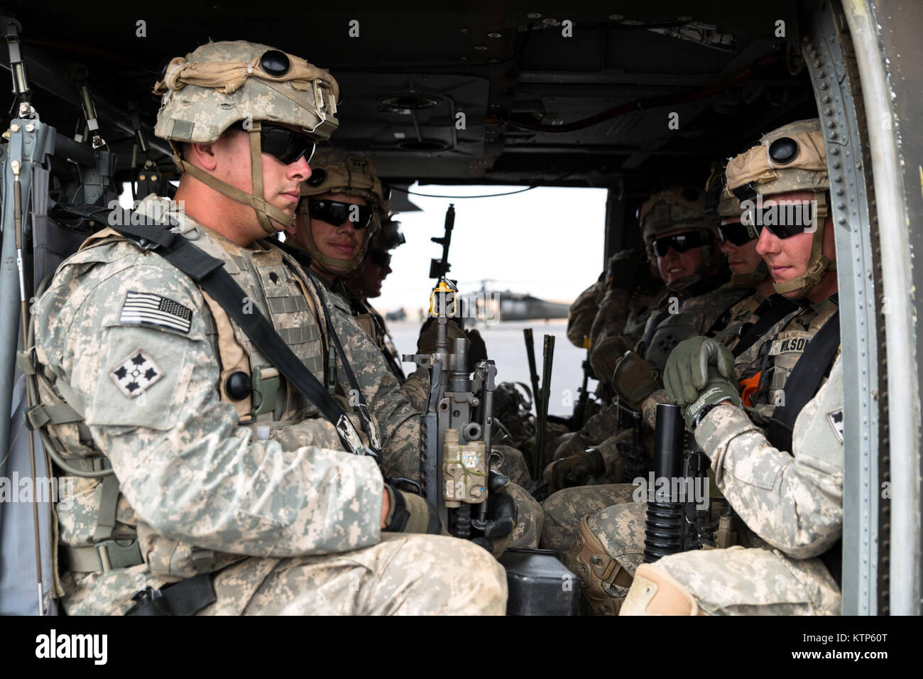 U.S. Army soldiers from 1st Battalion, 67th Armor Regiment, load onto ...