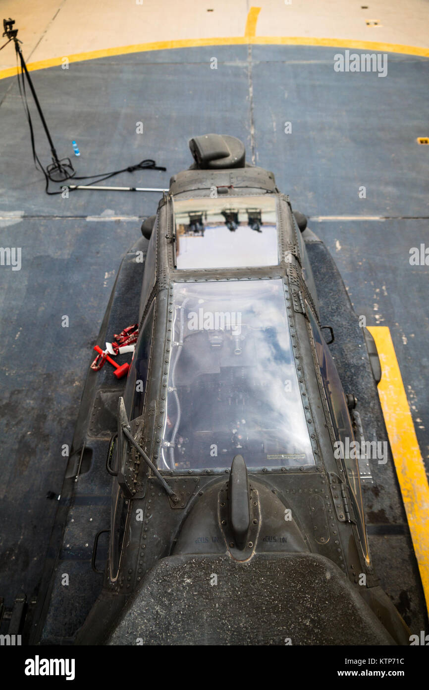 U.S. Army soldiers from the 42nd Combat Aviation Brigade prepare their ...