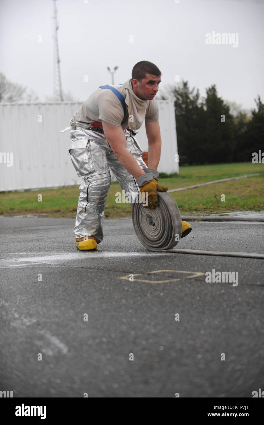 YAPHANK, New York-Members of the 106th Rescue Wing's Fire Department ...