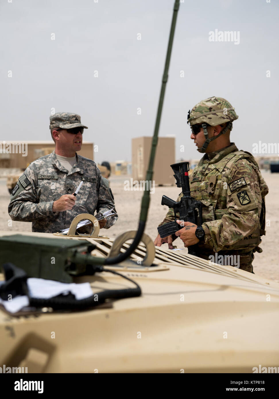 Soldiers from the 42nd Combat Aviation Brigade (CAB) assist in running ...