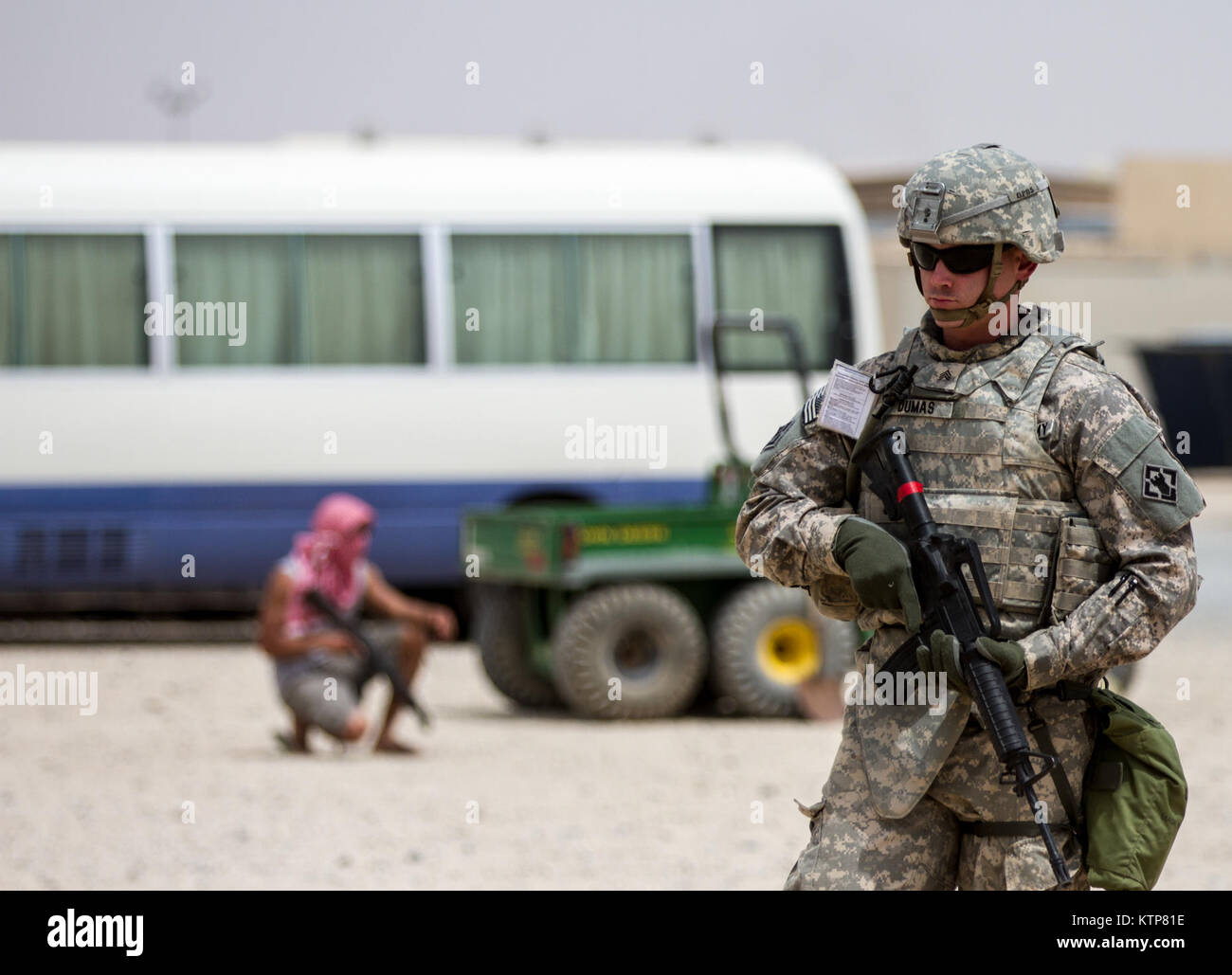 Soldiers from the 42nd Combat Aviation Brigade (CAB) assist in running ...