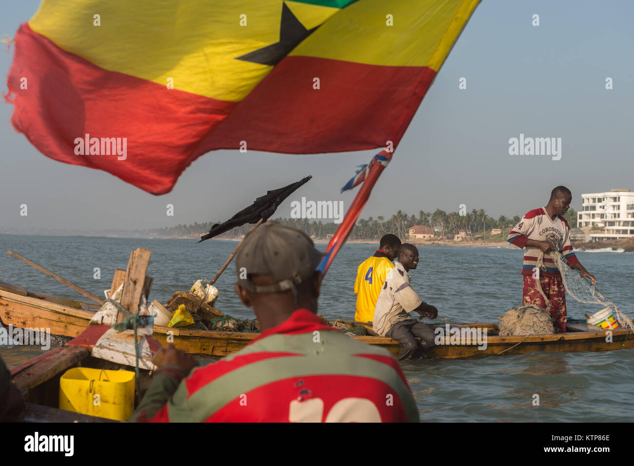 Fishermen in their open boat go fishing in the early morning. They ...