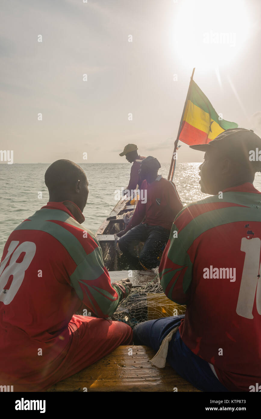 Fishermen in their open boat go fishing in the early morning. They ...