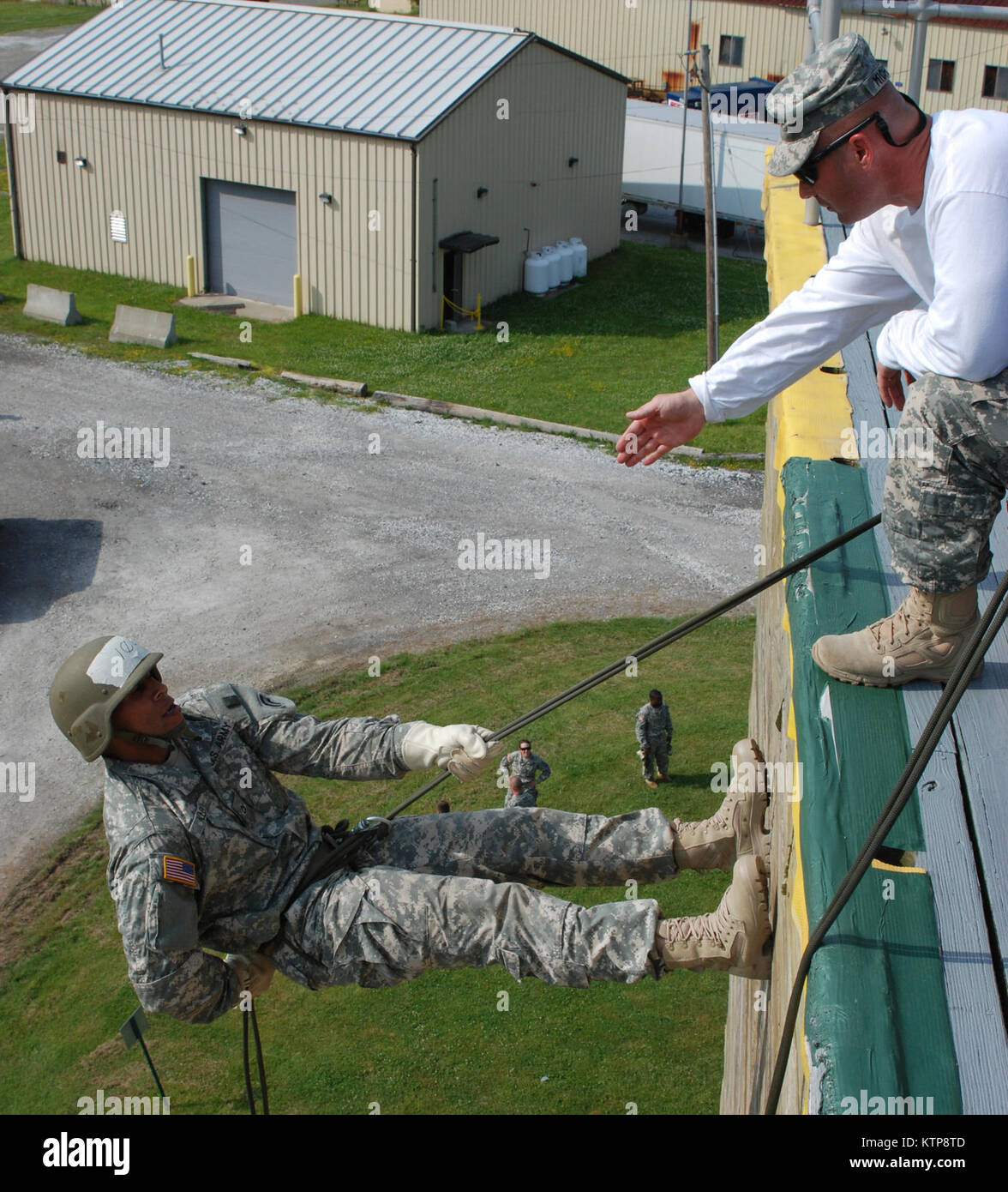 Maj. Mark Michels of the 153rd Troop Command delivers instructions to ...