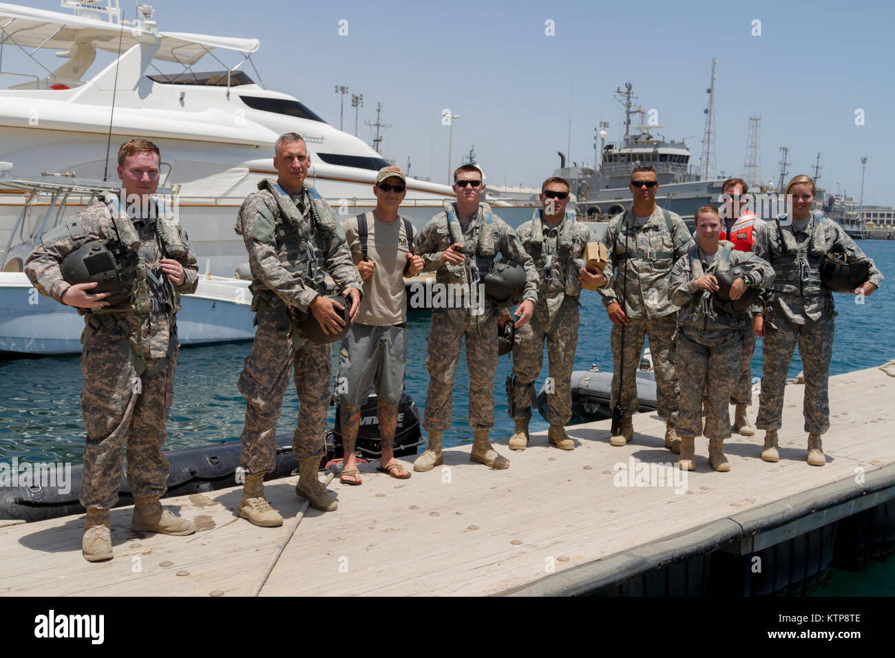 Soldiers of the 42nd Combat Aviation Brigade (CAB) work with Army ...