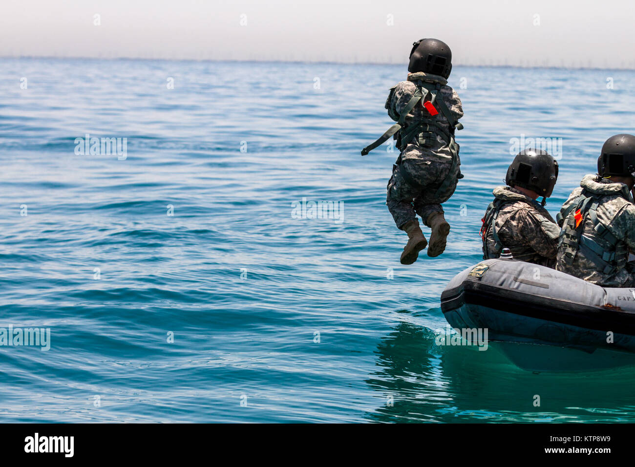 Soldiers of the 42nd Combat Aviation Brigade (CAB) work with Army ...