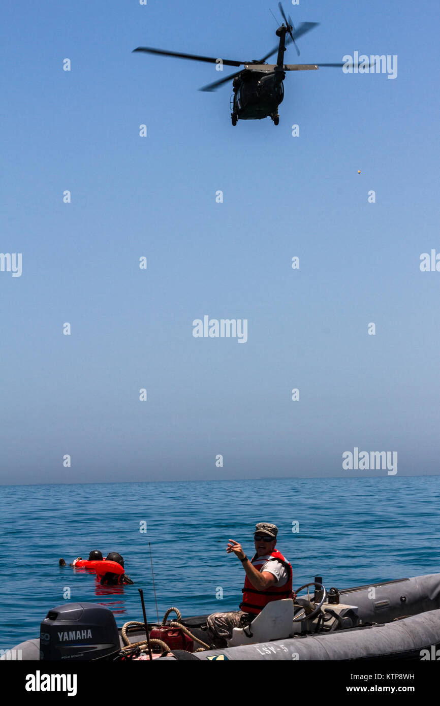 Soldiers of the 42nd Combat Aviation Brigade (CAB) work with Army ...