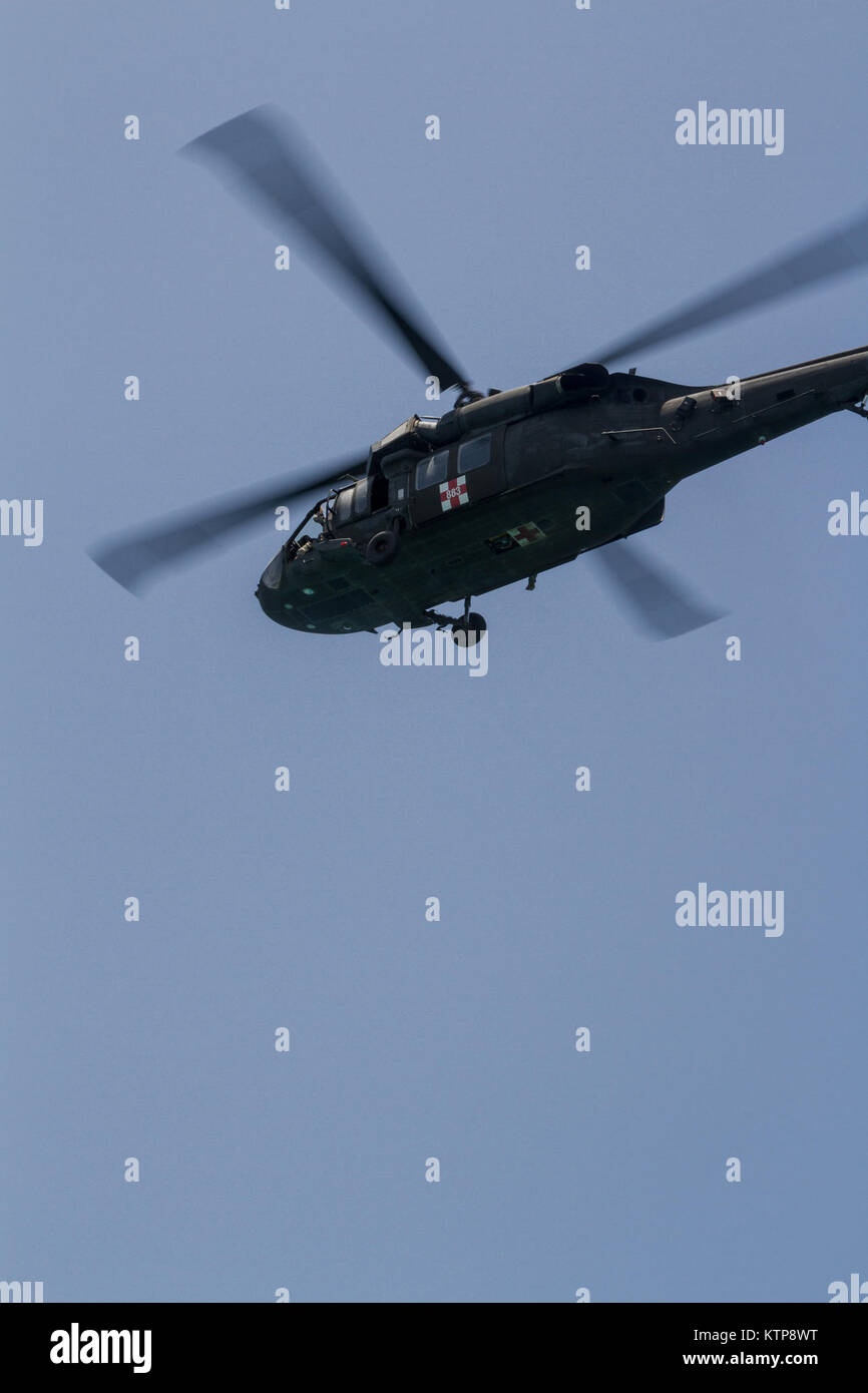 Soldiers of the 42nd Combat Aviation Brigade (CAB) work with Army ...