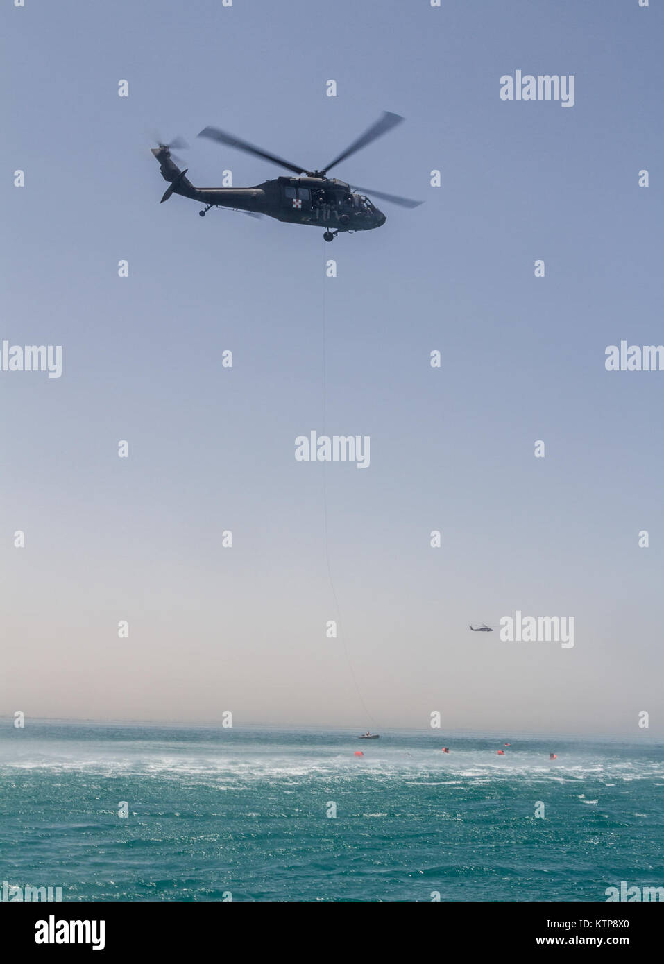 Soldiers of the 42nd Combat Aviation Brigade (CAB) work with Army ...